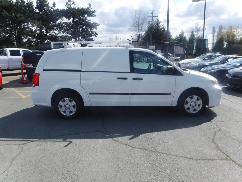 Repo.com | 2013 Dodge Cargo Van With Rear Shelving And Ladder Rack