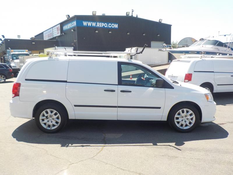 2014 Dodge Ram Caravan Cargo Van with Shelving & Ladder Rack | Repo.com