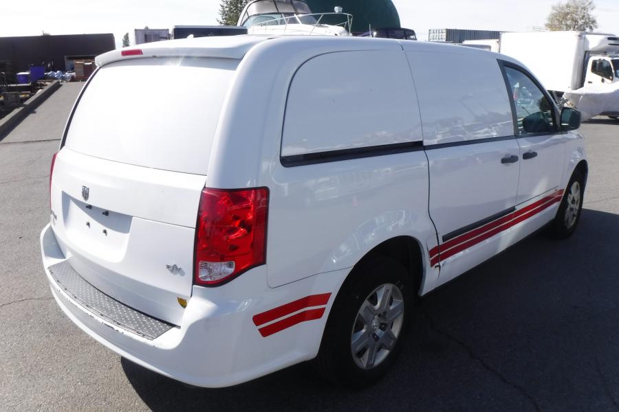 Repo.com | 2014 RAM Caravan Cargo Van With Rear Shelving