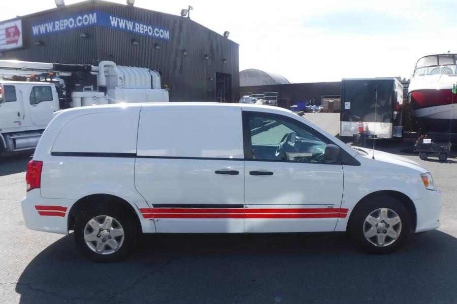 2014 RAM Caravan Cargo Van With Rear Shelving | Repo.com