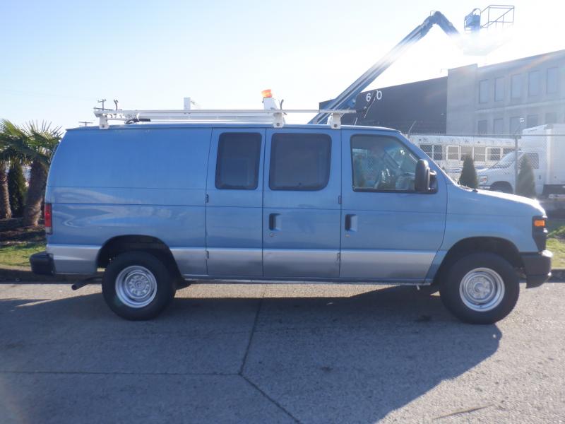 Repo.com | 2009 Ford Econoline E-250 Cargo Van Ladder Rack Rear Shelving