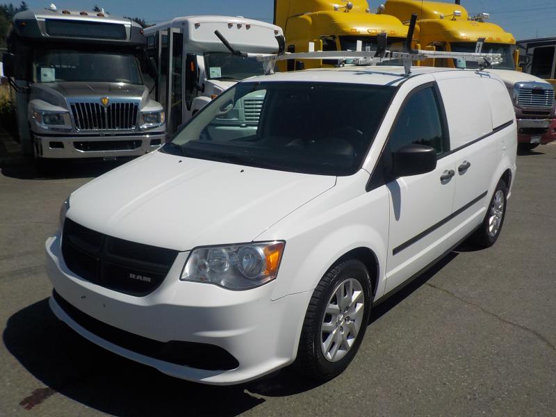 2014 Dodge Ram Caravan Cargo Van with Shelving & Ladder Rack | Repo.com