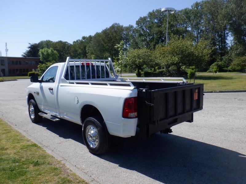 2012 RAM 2500 Regular Cab 8 foot box 4WD with Tommy Gate | Repo.com