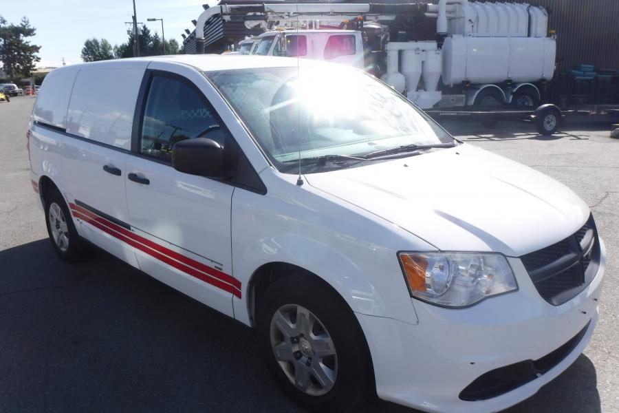 2014 RAM Caravan Cargo Van With Rear Shelving | Repo.com