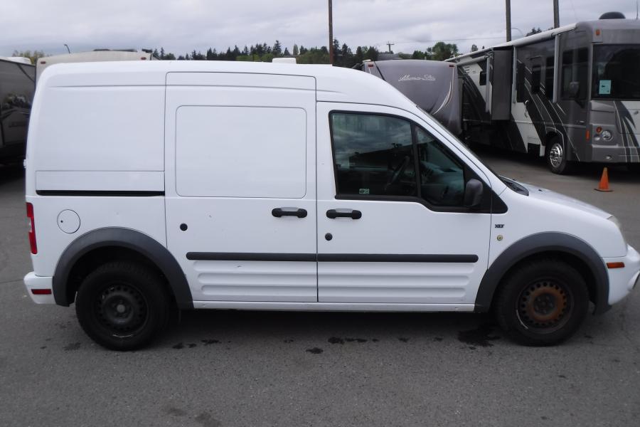 Repo.com | 2012 Ford Transit Connect XLT with Bulkhead Divider
