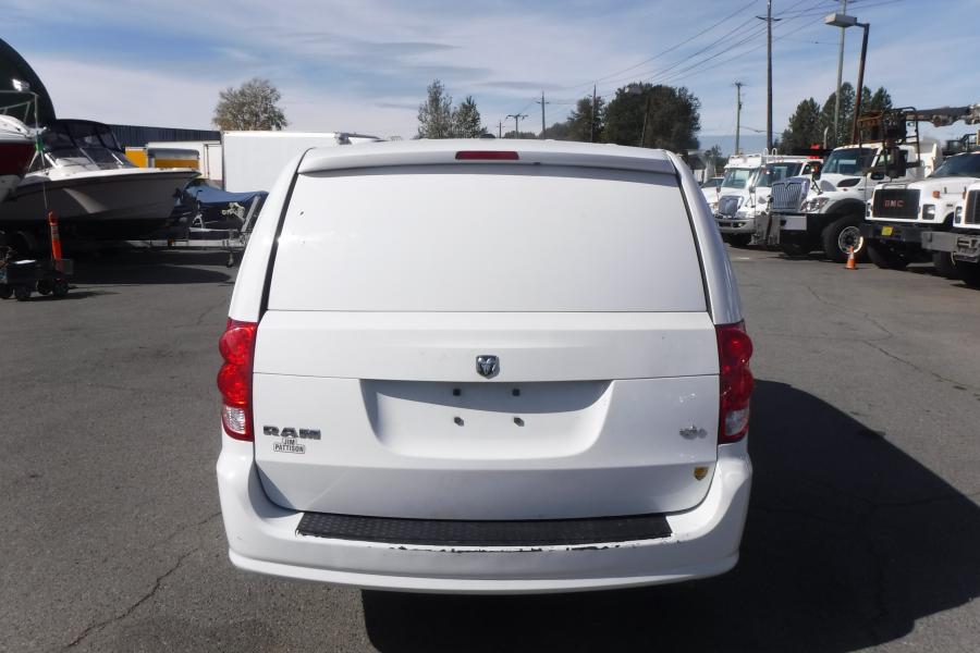 2014 RAM Caravan Cargo Van With Rear Shelving | Repo.com