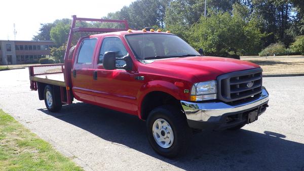 2004 Ford F-350 SD Crew Cab Flat Deck 4WD | Repo.com