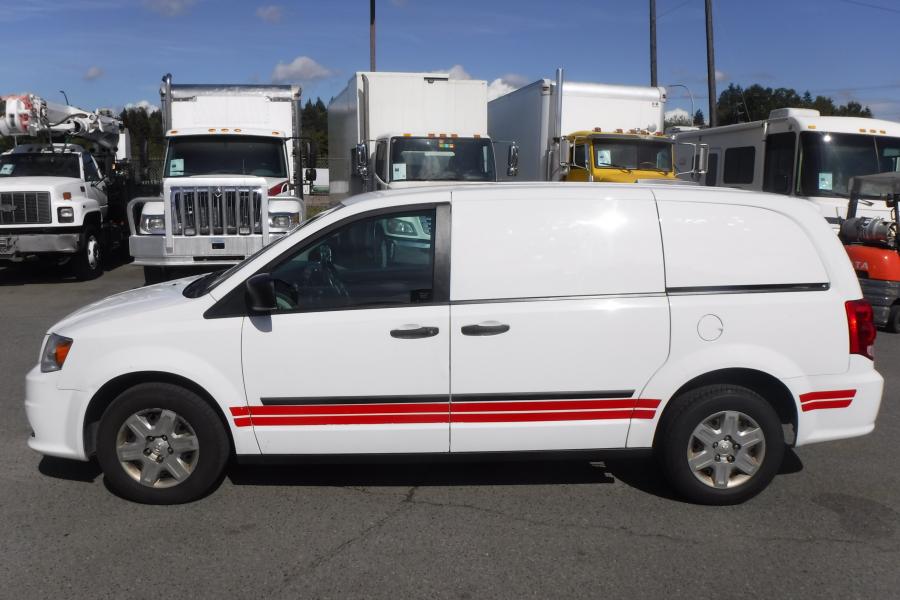 2014 RAM Caravan Cargo Van With Rear Shelving | Repo.com