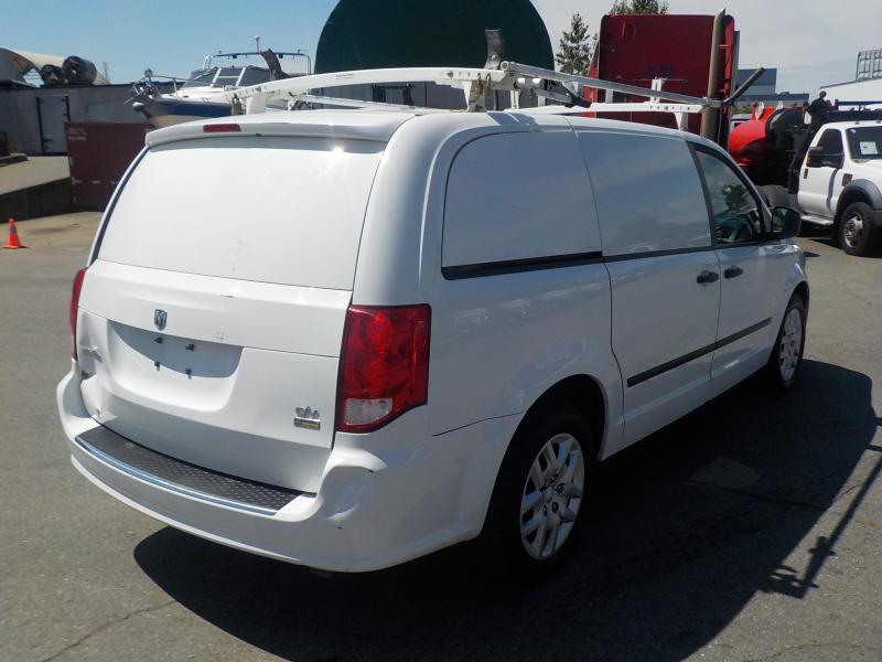 2014 Dodge Ram Caravan Cargo Van with Shelving & Ladder Rack | Repo.com