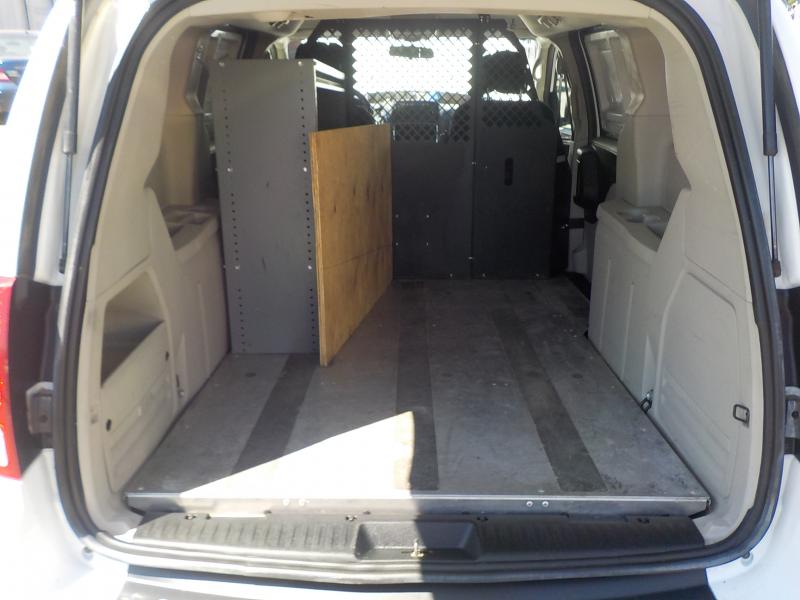 2014 Dodge Ram Caravan Cargo Van with Shelving & Ladder Rack | Repo.com