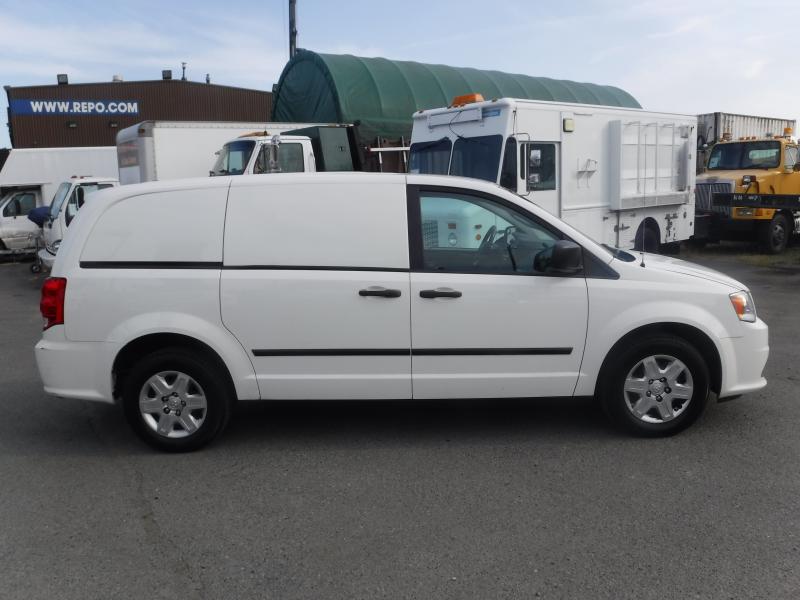2013 Dodge Caravan RAM Cargo Van with Rear Shelving | Repo.com