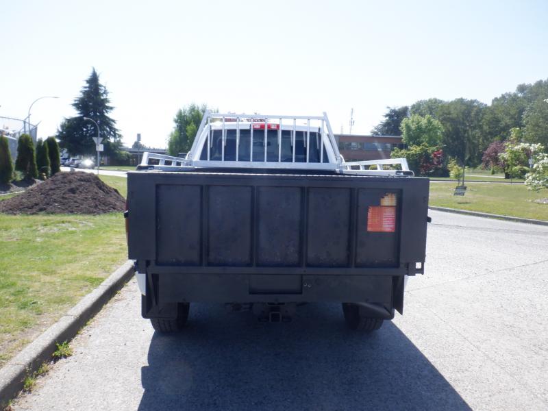 2012 RAM 2500 Regular Cab 8 foot box 4WD with Tommy Gate | Repo.com